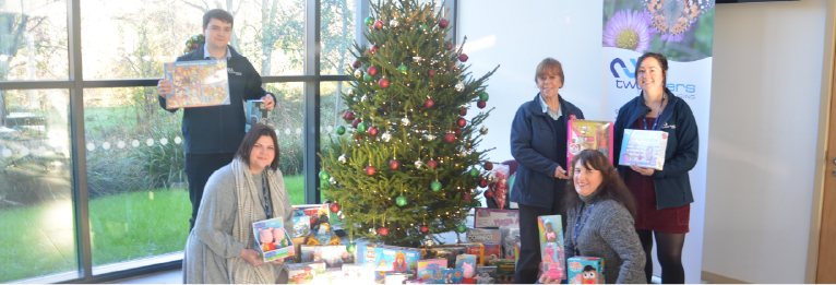 Two Rivers Housing teams donate gifts to Salvation Army - Two Rivers ...